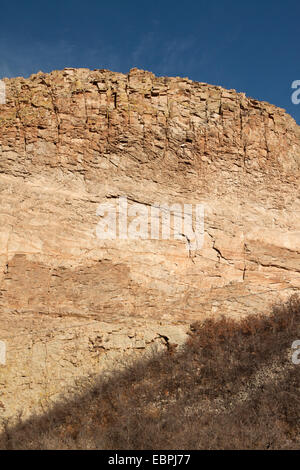 The towering cliff of the volcanic radial dike called Devil's ...
