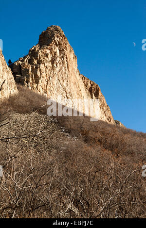 The towering cliff of the volcanic radial dike called Devil's ...
