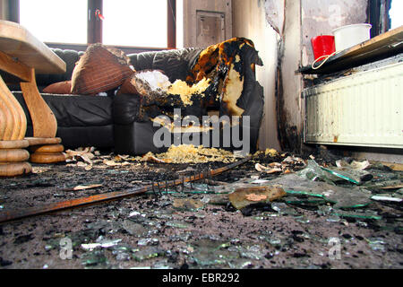 Burnt apartment house interior. Burned furniture. Consequences of fire ...