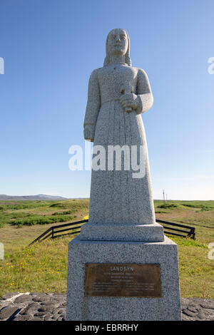 A statue next to the Strandarkirkja, Iceland Stock Photo - Alamy