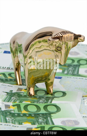 golden bull on euro money background. stock, business and finance ...