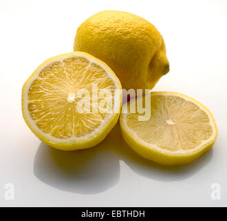 Lemon whole and half on a white background Stock Photo - Alamy
