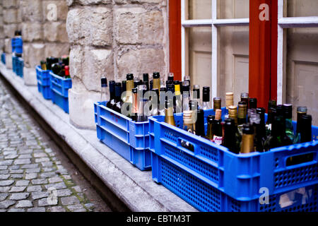 Glass recycling bins on a pavement in Brussels with bottle shapes Stock ...