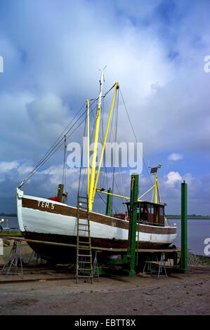 Fishing trawlers under repair at shipyard in Macduff in Aberdeenshire ...