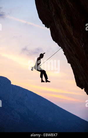 Rock climber falling of a cliff while lead climbing. Kalymnos Island ...