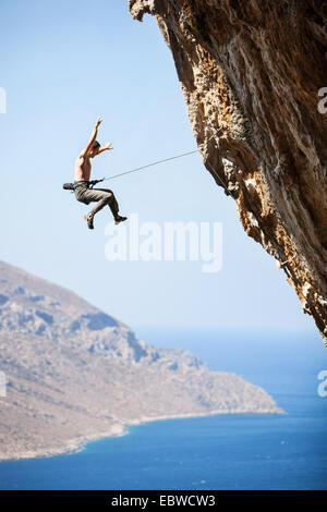 Rock climber falling of a cliff while lead climbing. Kalymnos Island ...