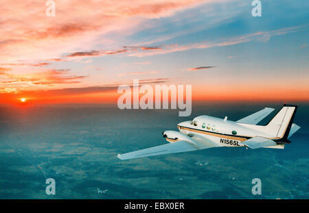 Small twin engine aircraft on the tarmac Stock Photo - Alamy