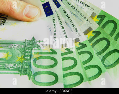 Fan of One Hundred Euro Banknotes with Black Wallet on Wooden ...