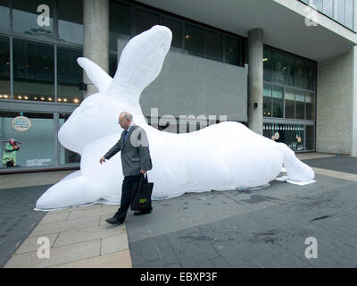 London,UK. 5th December 2014. Five 7metre high inflatable white rabbits ...