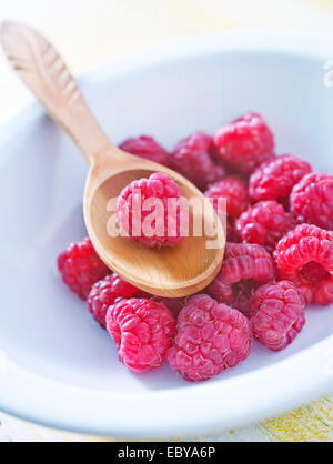 Sweet ripe tasty yellow raspberry with leaf Stock Photo - Alamy