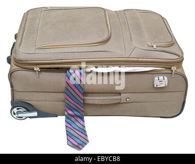 tie fell out of the ajar suitcase close up isolated on white background ...