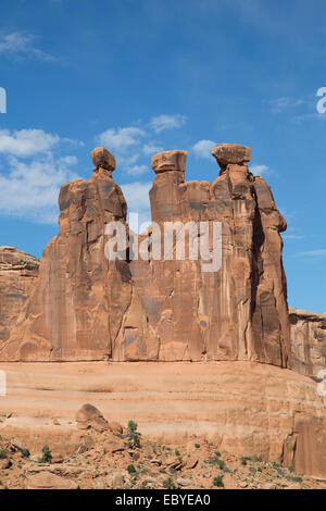 Three Gossips or Three Sisters rock formation in early morning light at ...