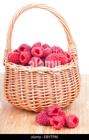 raspberry in a basket isolated on white Stock Photo - Alamy