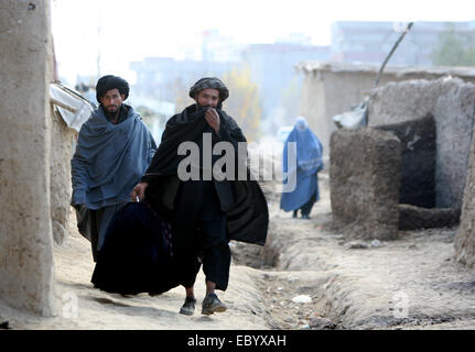 Kabul, Afghanistan. 2nd Dec, 2014. An Afghan man works at a slum area ...