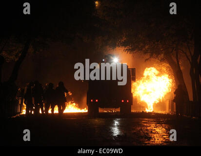 A riot police vehicle is seen during a protest against Chile's ...