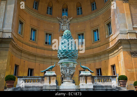 Ancient bronze Pigna, or pine cone, statue in the Vatican courtyard ...