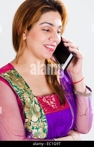 The young lady playing mobile phone games at home Stock Photo - Alamy