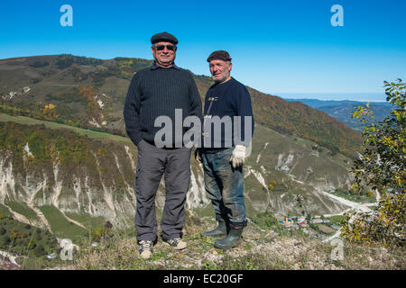 Old Chechen man at an overlook in the Chechen mountains, Chechnya ...