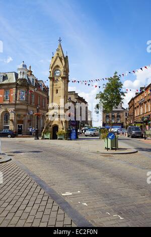 Town clock in the paved Market Square, King Street in Penrith town ...