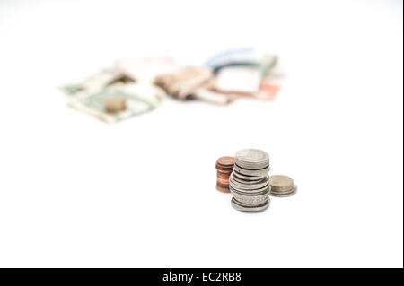 Three piles of coins, gold, silver, and bronze, with mountain of money ...