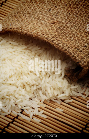 Uncooked rice in the cooking sack isolated on white background Stock ...