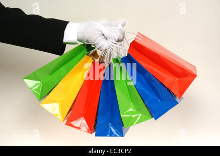 Butler with bags Stock Photo - Alamy