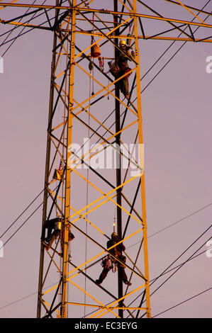 Line men working on a powerline in Hennef Germany Stock Photo - Alamy