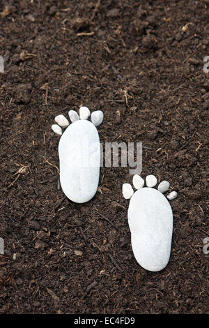 feet from stones Stock Photo - Alamy