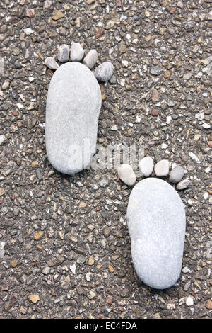 feet from stones Stock Photo - Alamy
