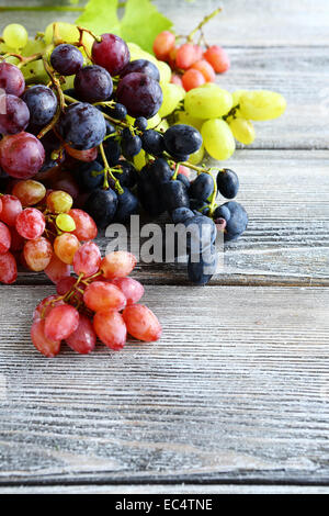 Mix of Fresh grapes on the boards, tasty food, rich of resveratrol ...