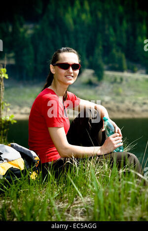 hiking woman in front of wilde nature Stock Photo - Alamy
