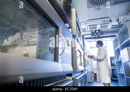 Female technician working at biochemistry labroratory Stock Photo - Alamy