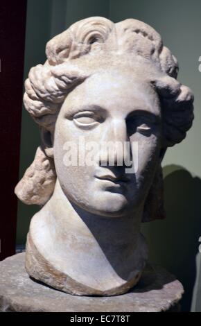 Colossal marble head of Apollo. The nose, chin, mouth, forehead and ...