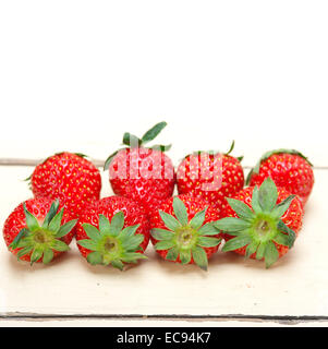Fresh organic strawberry over white rustic wood table Stock Photo - Alamy