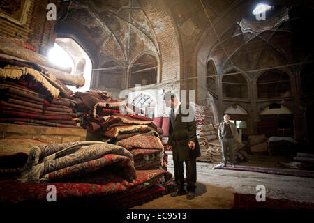 Tehran, Iran. 10th Dec, 2014. Iranian women walk in the city of Qazvin ...