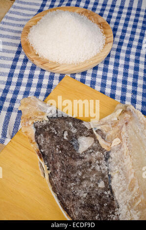Salt preserved cod fish with its main ingredient Stock Photo - Alamy