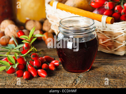 The thick syrup made from rose hips Stock Photo - Alamy