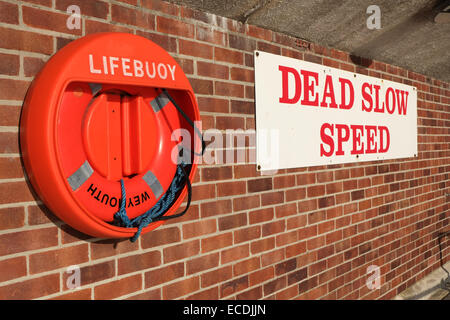 Large dead slow speed sign in Weymouth harbour to slow approaching ...