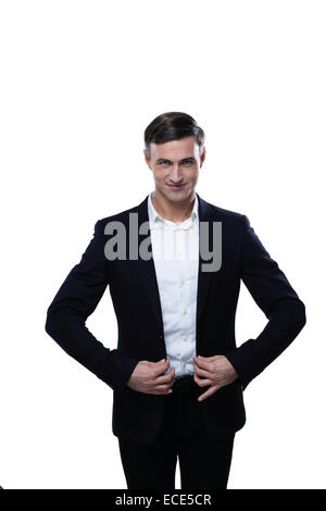 manager in a white shirt pulls the tie dark background Stock Photo - Alamy