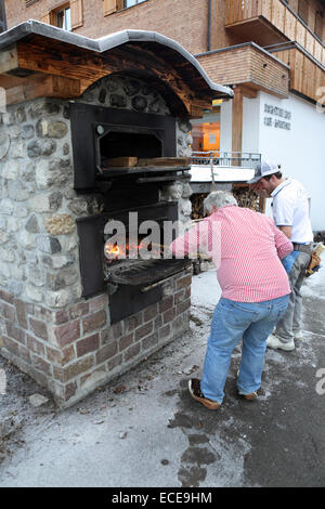 Baker Clemens Walch at work at the Backstube Lech bakery, Lech, Austria ...