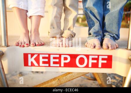 Lifeguard warning sign on the beach of Surfers Paradise, Gold Coast ...