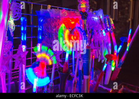 Neon light toys for sale at a stall in Ambleside, UK Stock Photo - Alamy