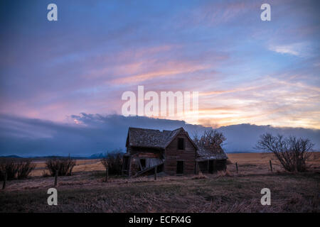 Canada, Alberta, Sunset over farmhouse Stock Photo - Alamy