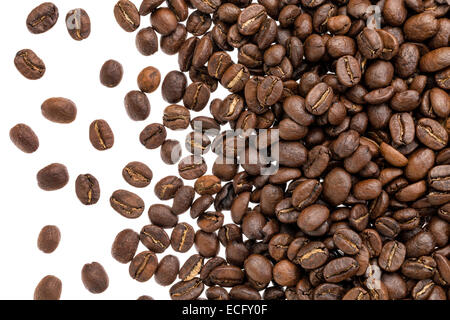 Roasted coffee beans in shells against white background Stock Photo - Alamy