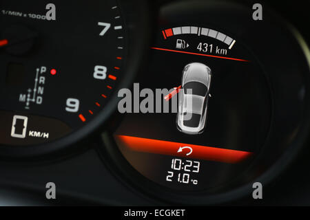 Color detail of an error message on a car dashboard. Door opened alarm ...
