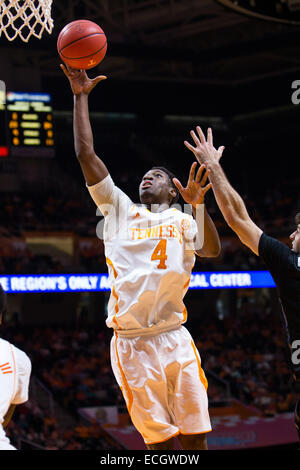 December 14, 2014: Armani Moore #4 of the Tennessee Volunteers shoots ...