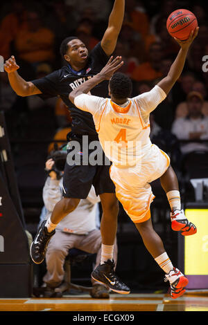 December 14, 2014: Armani Moore #4 of the Tennessee Volunteers shoots ...