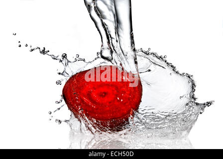 red beet with water splash isolated on white Stock Photo - Alamy