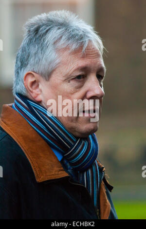 First Minister Peter Robinson at Stormont, Belfast, watched by Nigel ...