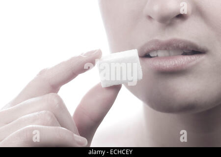 Sugar Cube woman mouth and teeth Stock Photo - Alamy